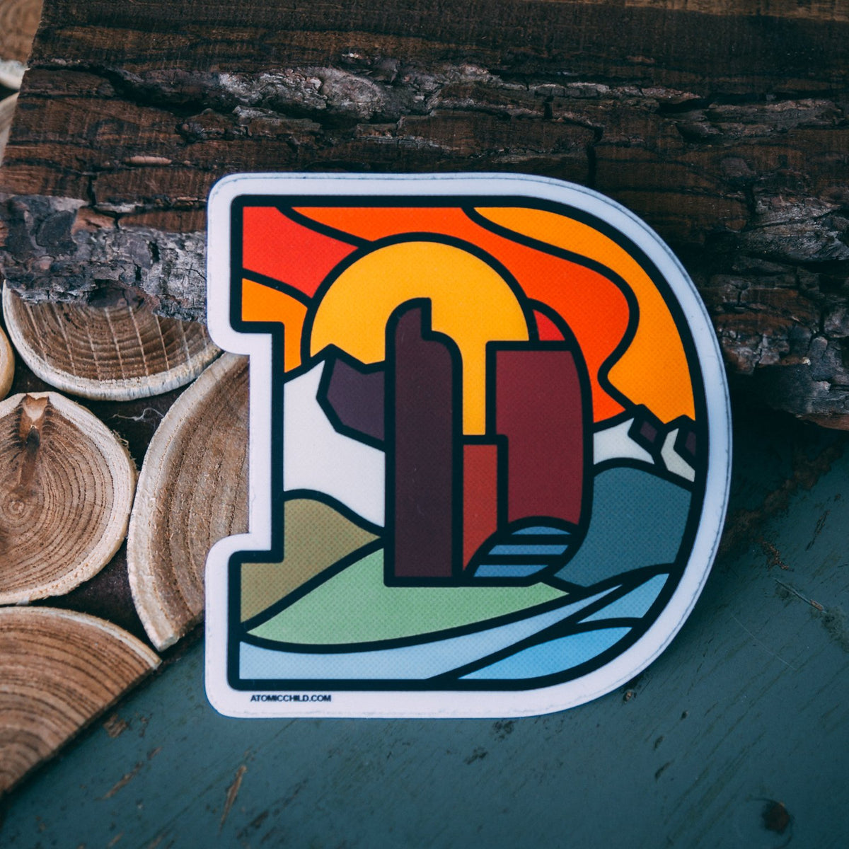 Denver D Sticker — Atomicchild